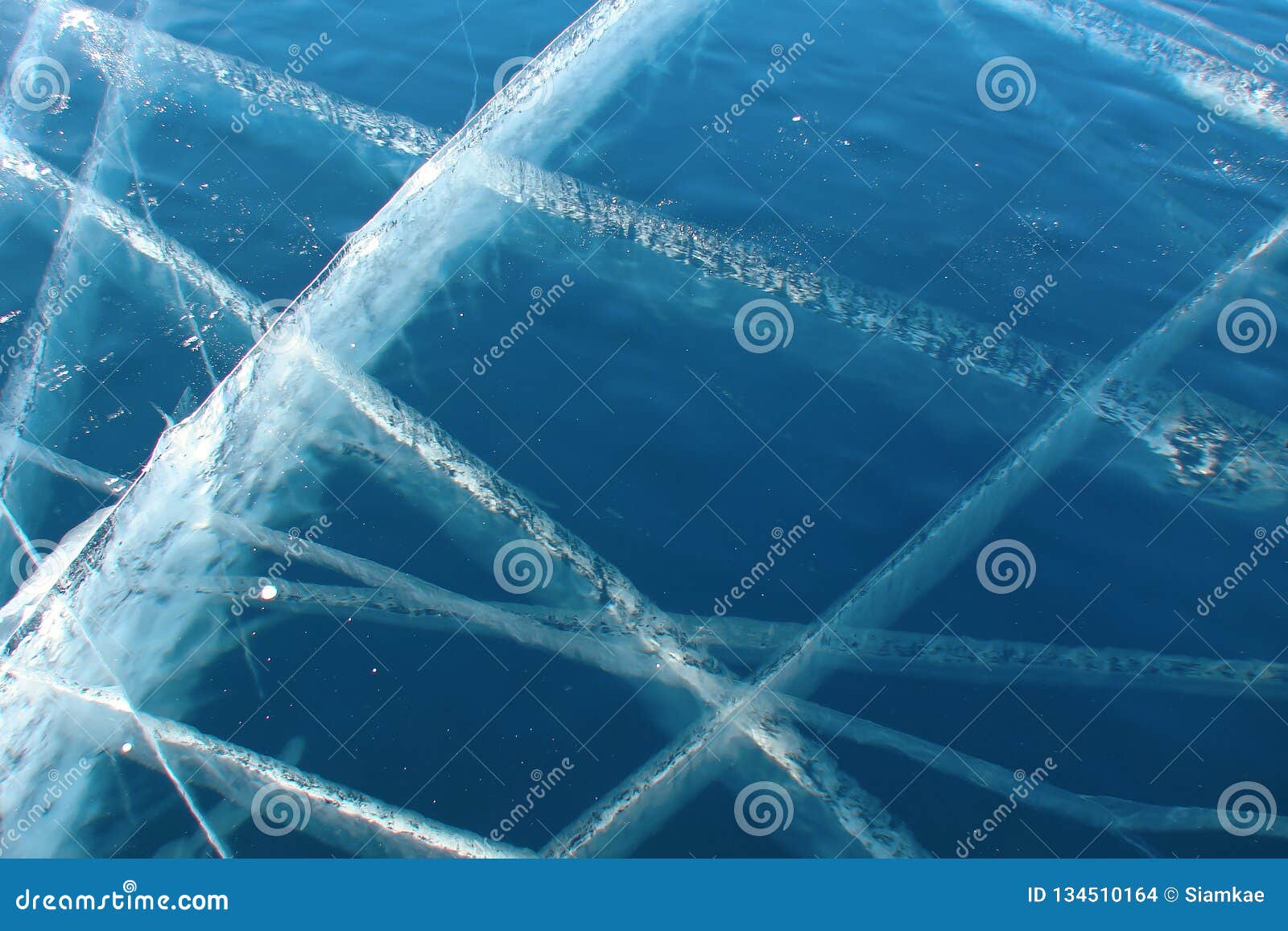 White Intersecting Lines on Dark-blue Transparent Ice Stock Photo ...