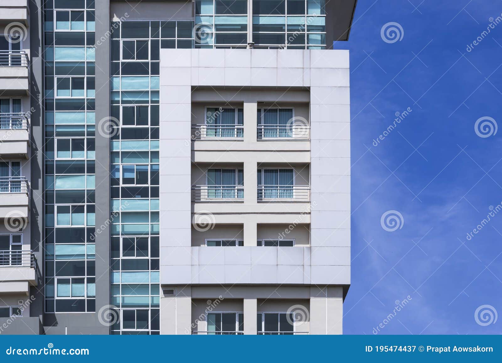 Glass Windows and Balcony on Exterior View of Modern High Building with ...