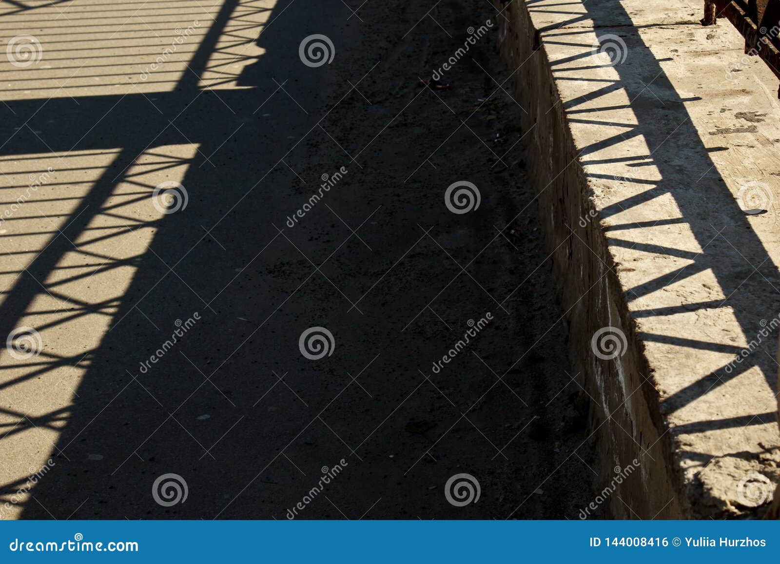 Geometric Shadows from the Grid on the Ground. View from Above Stock ...
