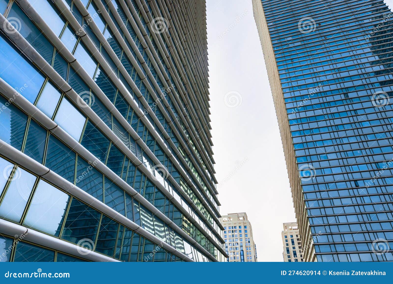 The Geometry of Modern Urban Architecture is Reflected in the Glass ...