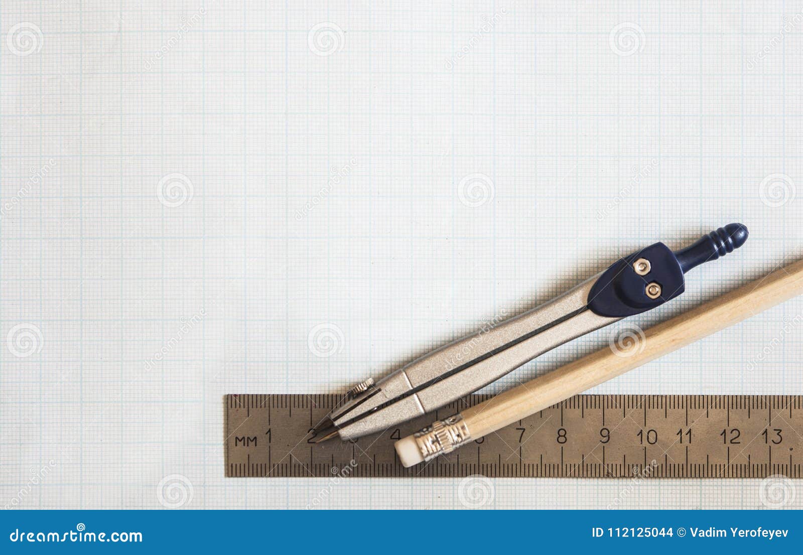 Pencil, Compass and Rulers on Graph Paper Background Stock Photo ...