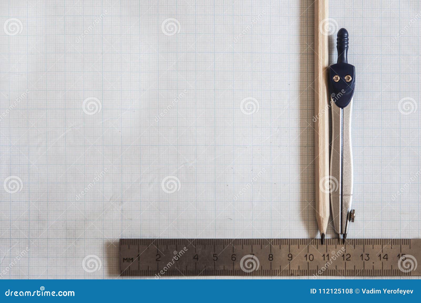 Pencil, Compass and Rulers on Graph Paper Background Stock Photo ...