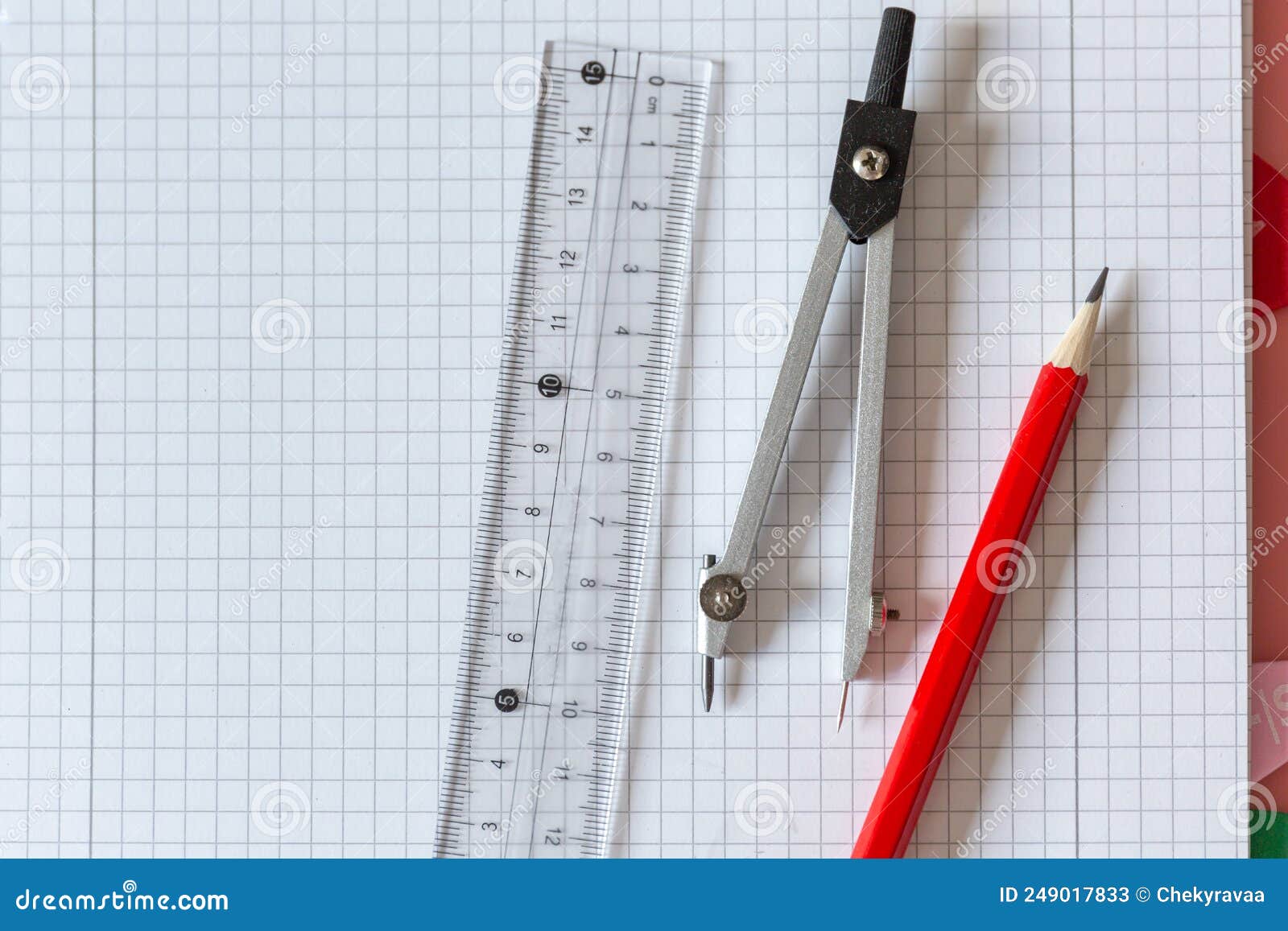 Geometry Set on Open Notebook. Compass Drawing Tool, Ruler, Pencils for ...