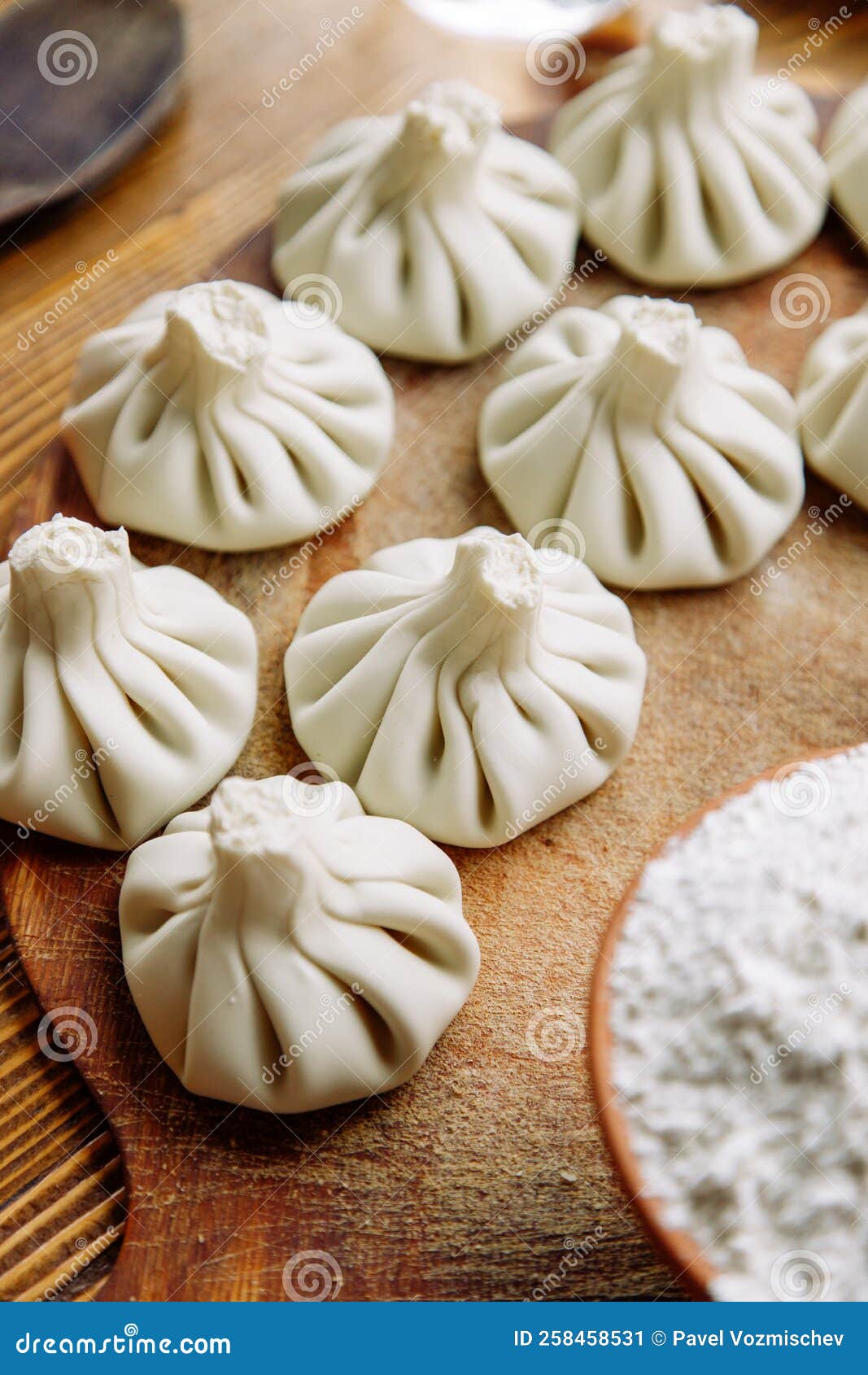 Georgian National Cuisine Khinkali, the Cooking Process. Top View of a ... Georgian National Cuisine Khinkali, the Cooking Process. Top View of a ...