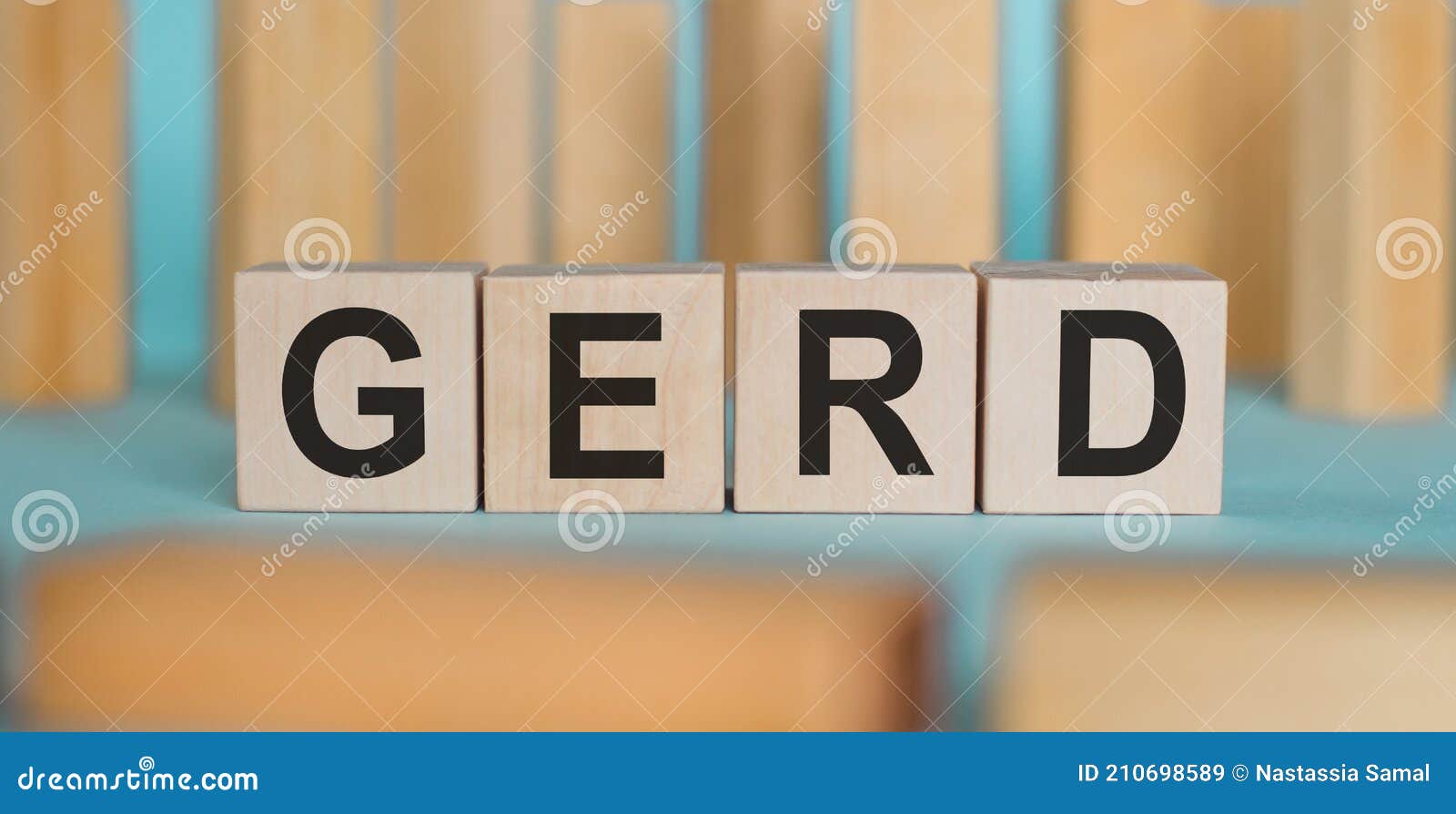 GERD Word Written On Wooden Blocks On Light Blue Background Royalty ...