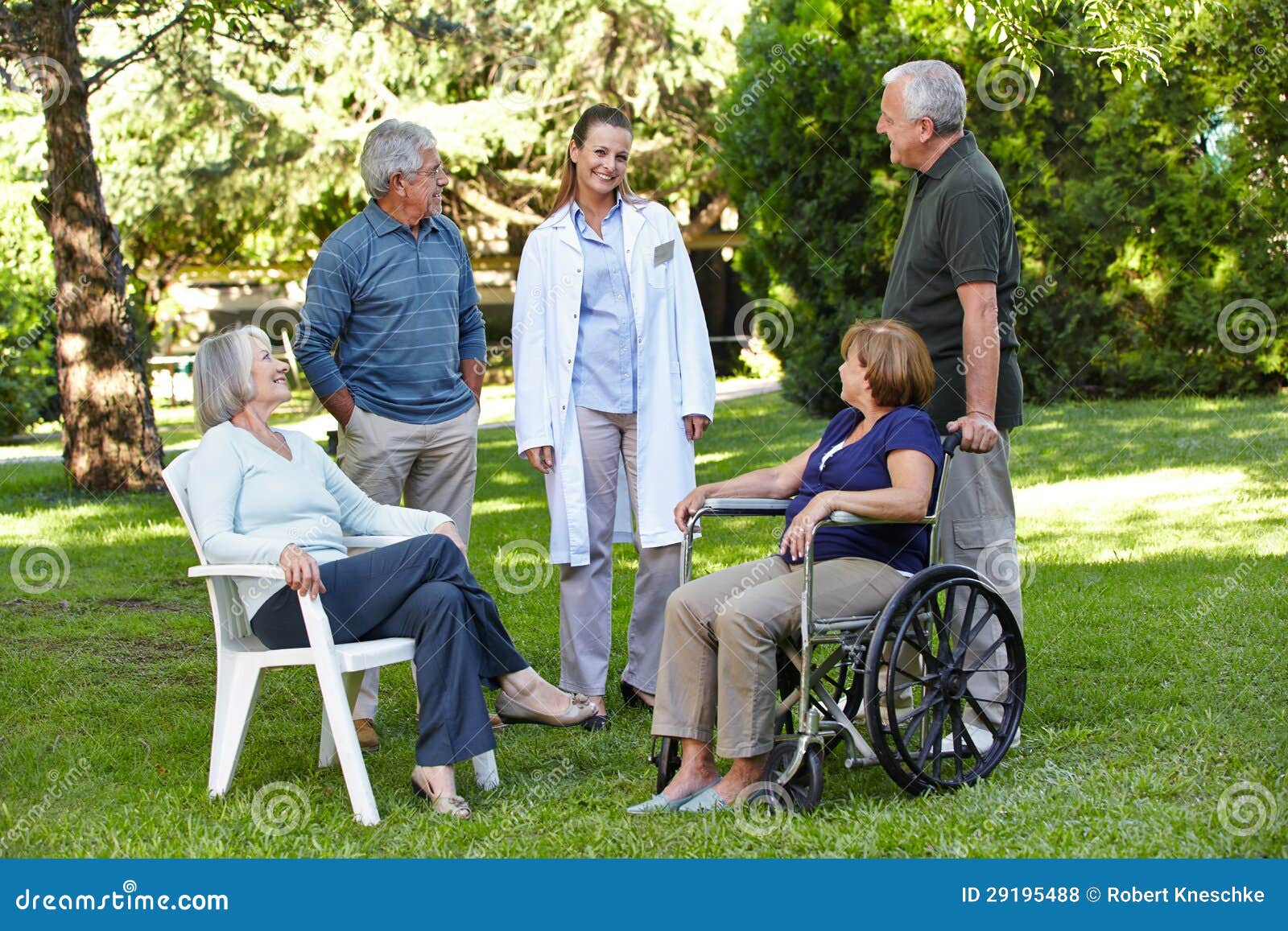 Geriatric Nurse with Senior Group Stock Photo - Image of joyful, garden ...