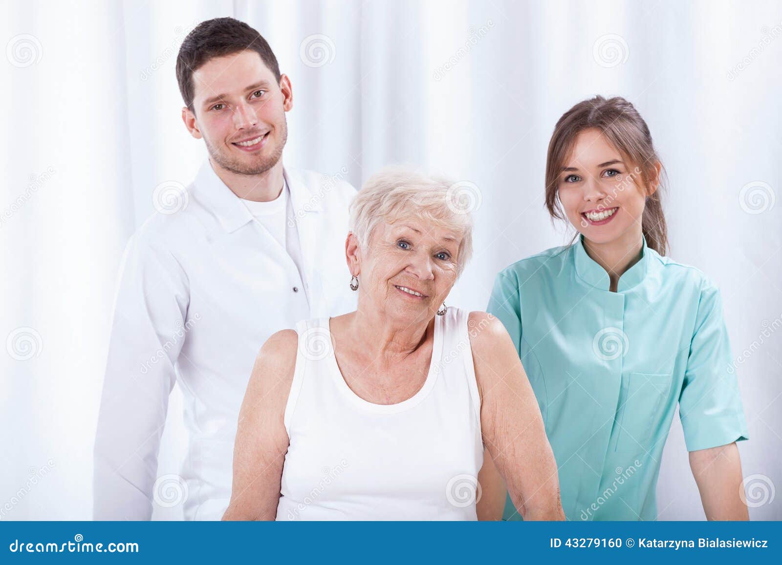 Geriatric Patient with Her Physiotherapists Stock Photo - Image of ...