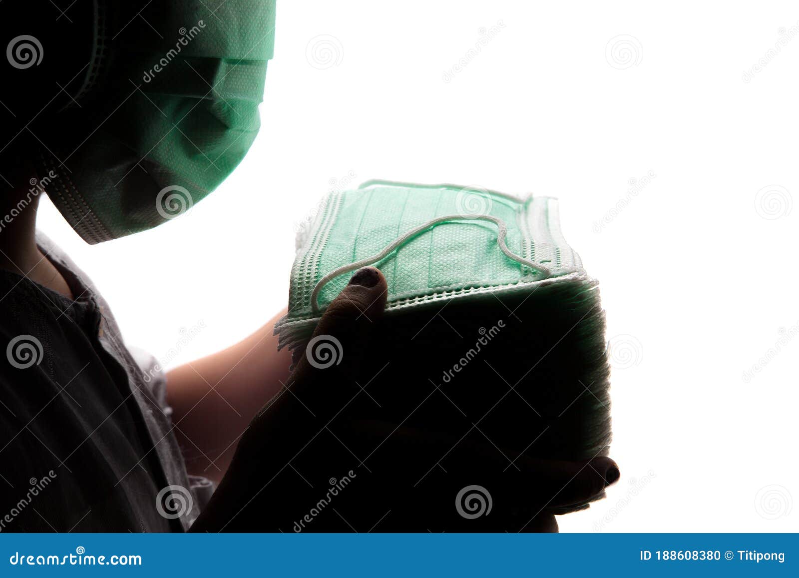 Germ Protection Mask in the Hand on a White Background Stock Photo ...