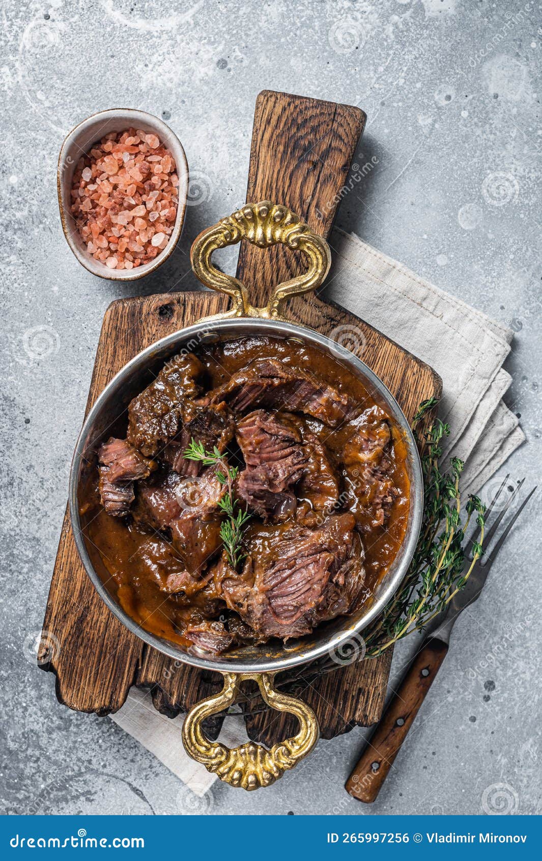 German Braised Beef Cheeks in Brown Red Wine Sauce. Gray Background ...
