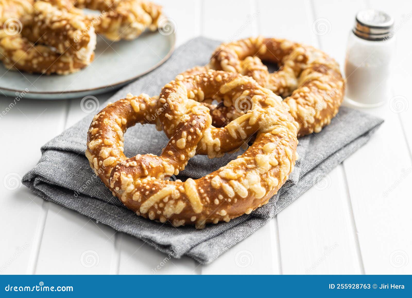 German Bread Pretzel with Baked Cheese on Kitchen Table Stock Image ...