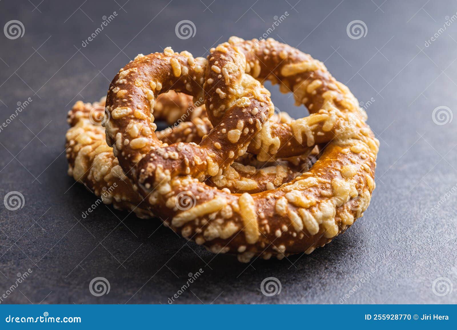 German Bread Pretzel with Baked Cheese on Kitchen Table Stock Photo ...