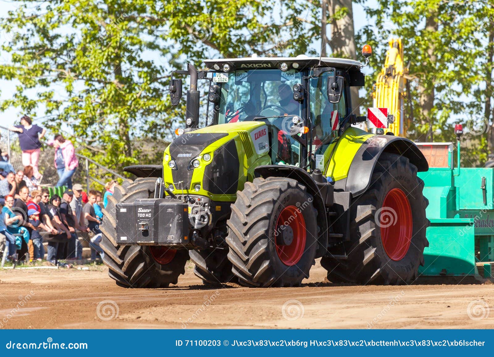 German Claas Axion Tractor Drives on Track by a Traktor Pulling Event ...