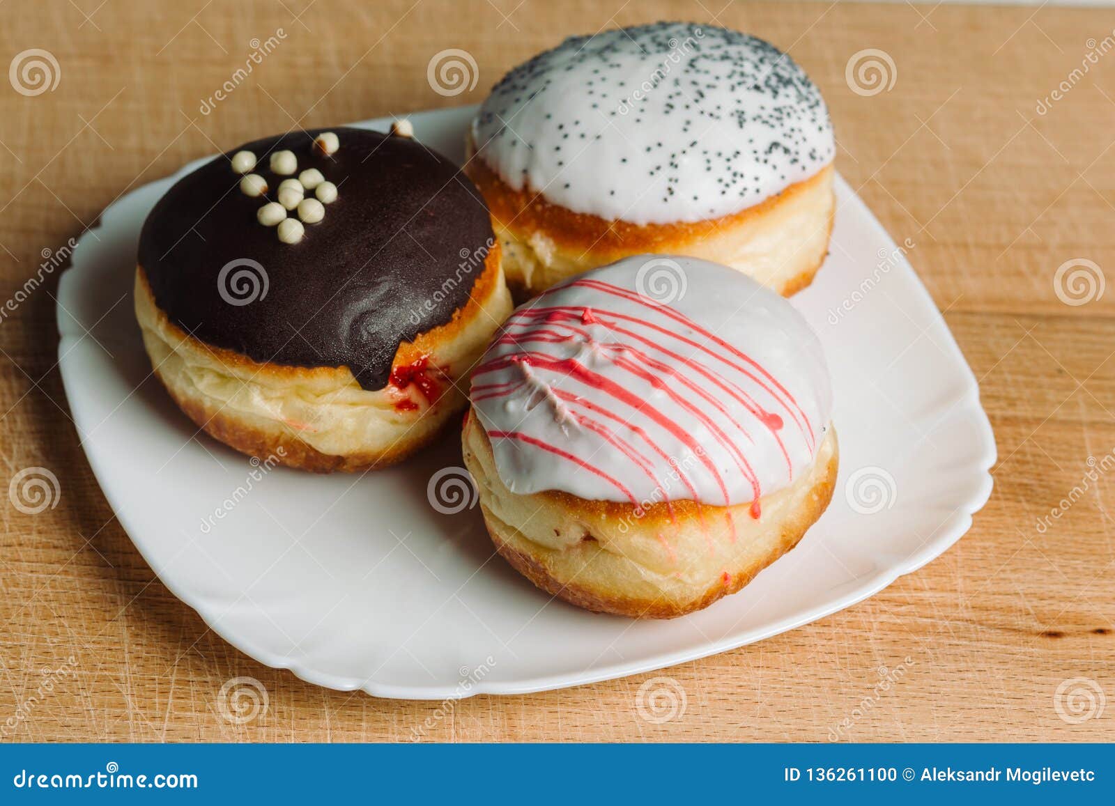 German Donuts - Three Donuts with Different Icing. Stock Photo - Image ...