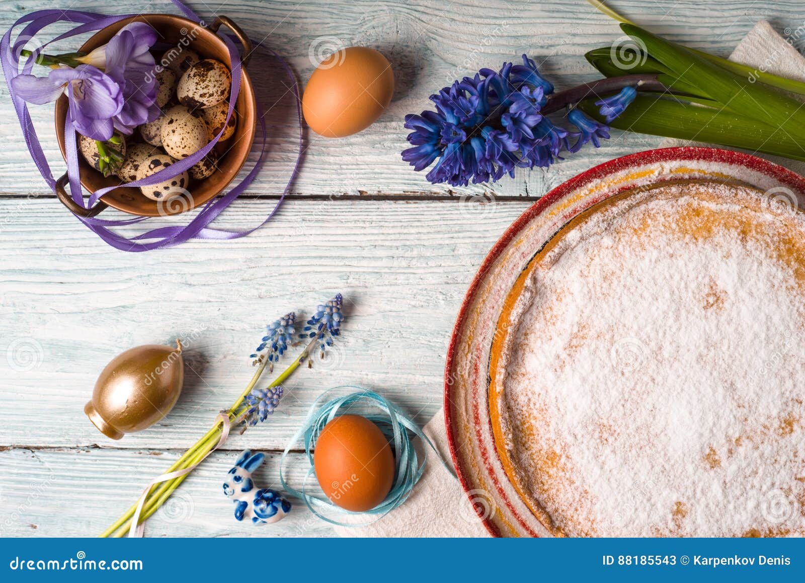 German Easter Cake with Decoration and Flower on the White Wooden Table ...