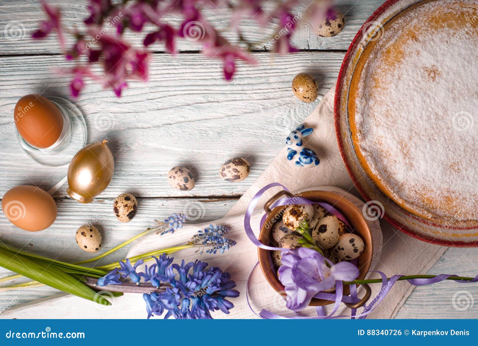 German Easter Cake, Eggs, Flowers, Ribbons on the Table Copy Space ...