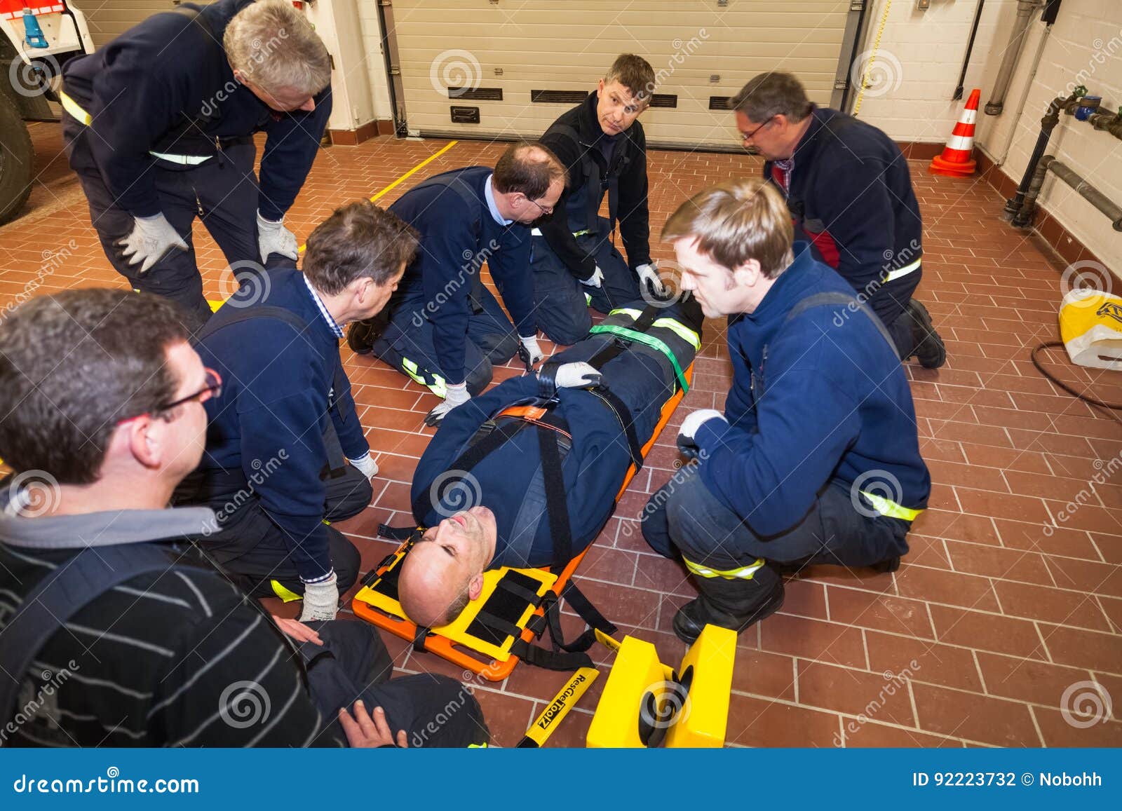 German Firefighter Team in an Exercise with a Injured in a Stretcher ...