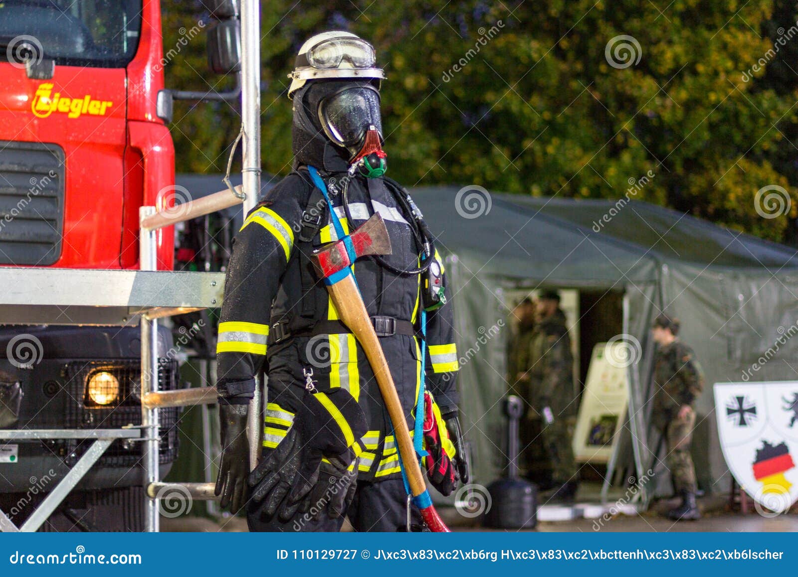 German Fireman Puppet Stands Near a Fire Engine on a Presentation ...