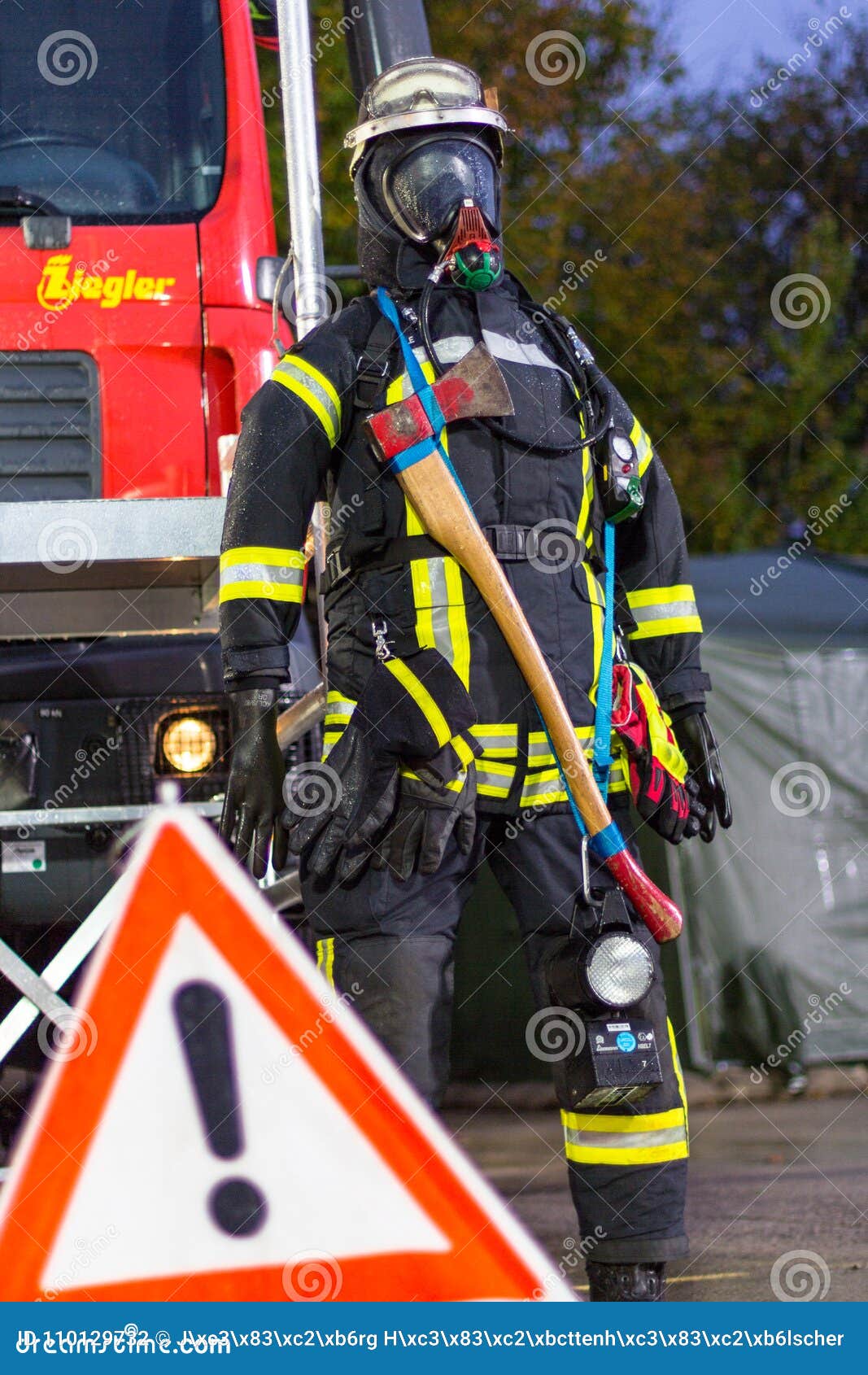 German Fireman Puppet Stands Near a Fire Engine on a Presentation ...