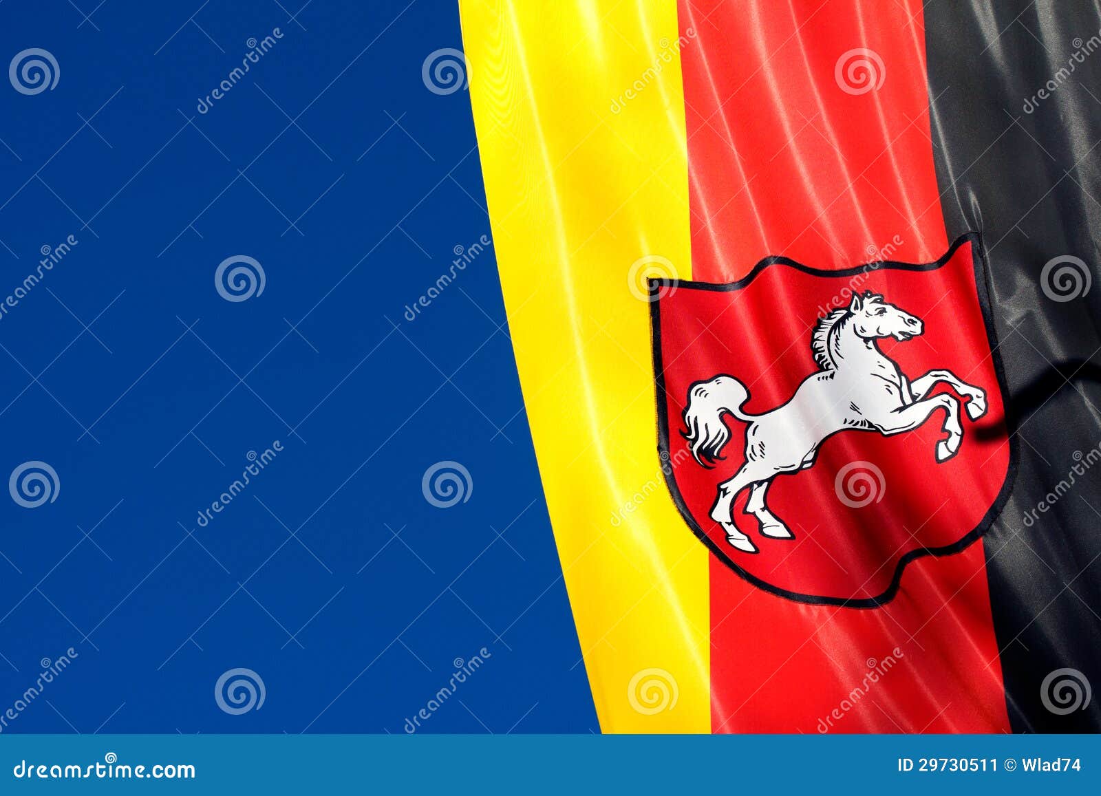 German Flag of Lower Saxony Against the Blue Sky Stock Image - Image of ...