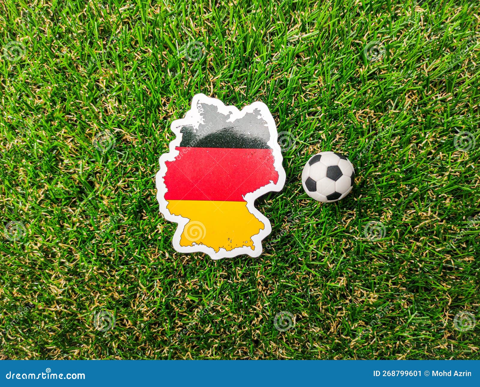 German Flag Sticker is on a Green Field. Stock Image - Image of trace ...