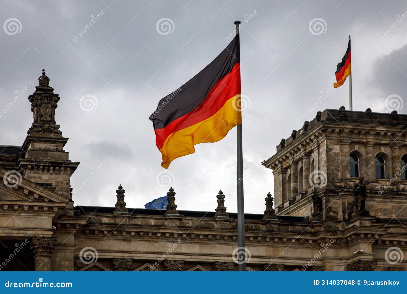 The German Flag Waves Proudly Stock Photo - Image of building, landmark ...