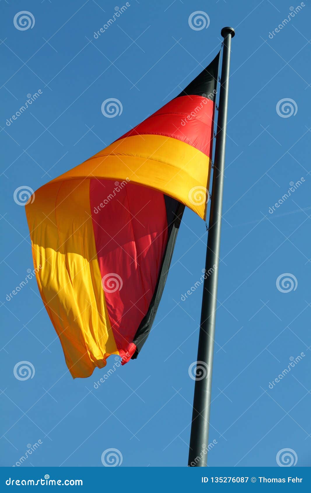 German flag in the wind stock image. Image of national - 135276087
