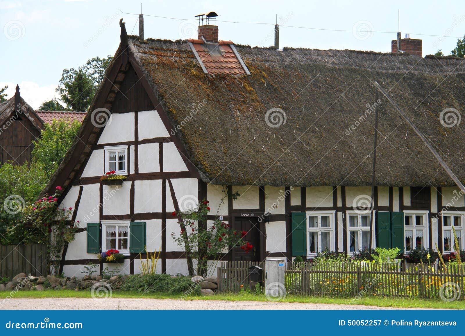 German house with hay roof stock image. Image of house - 50052257
