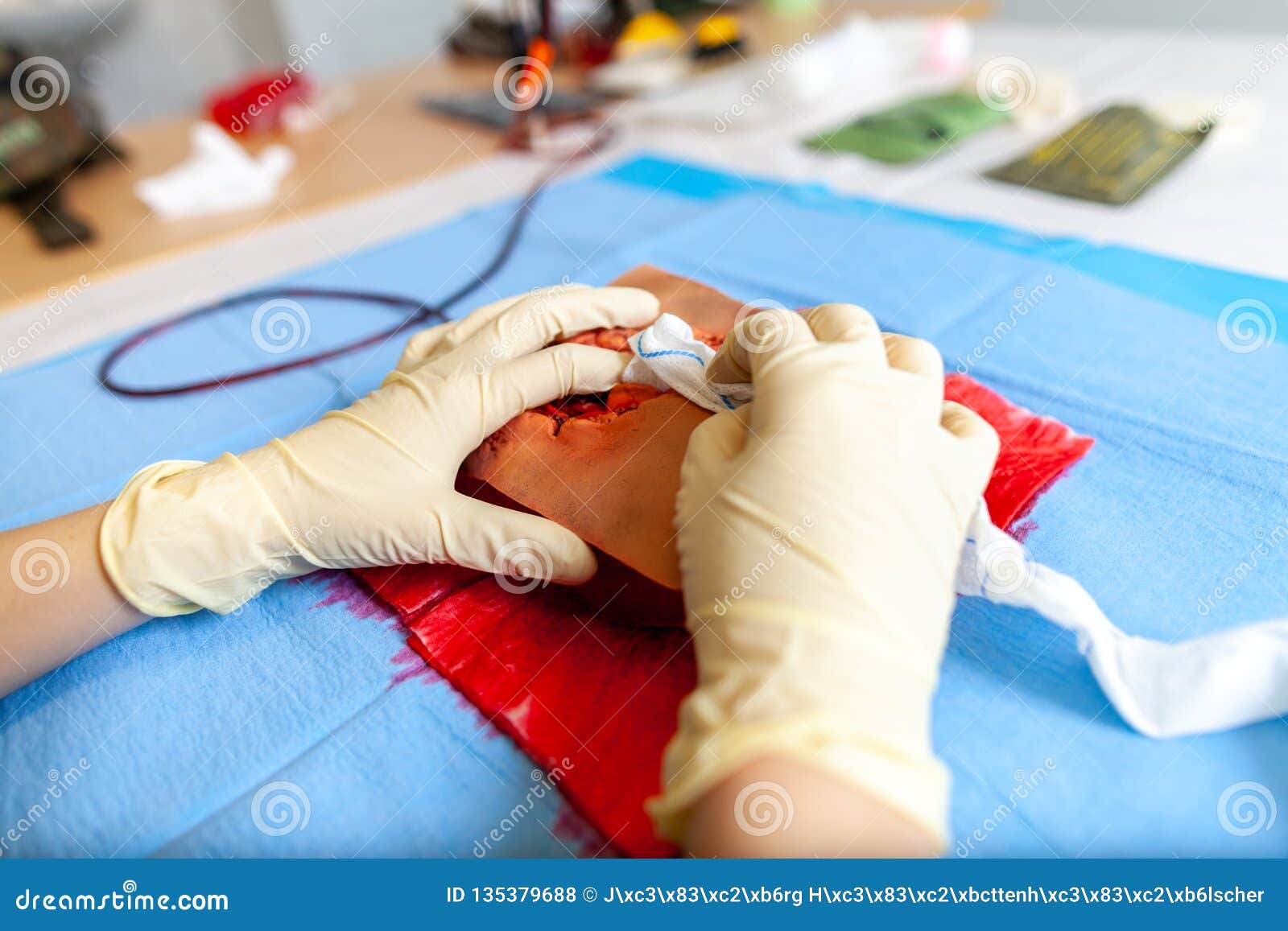 A Medic Practice Bleeding Control on a Wound Dummy Stock Photo - Image ...