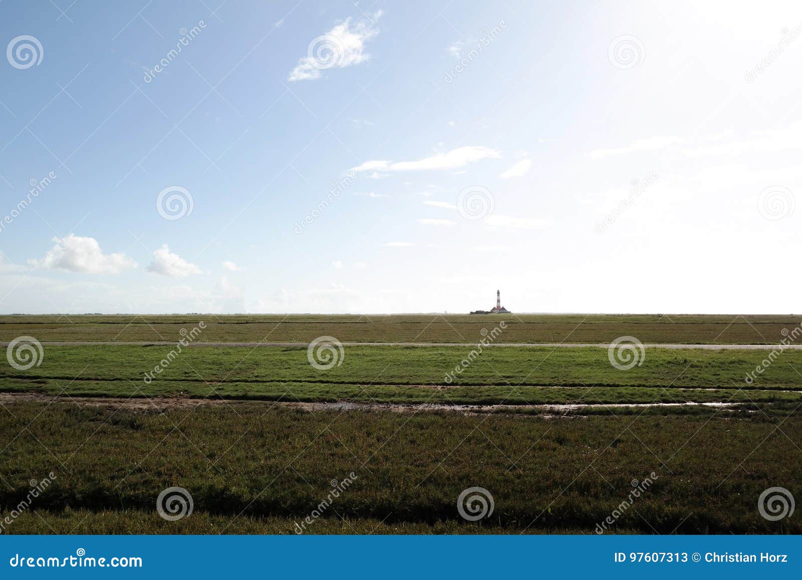 German North Sea Coast with Lighthouse on Distant Horizon Stock Image ...