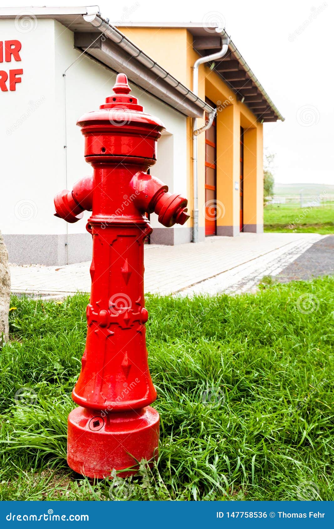 Hydrant in Front of a Fire Station Stock Photo - Image of maintenance ...