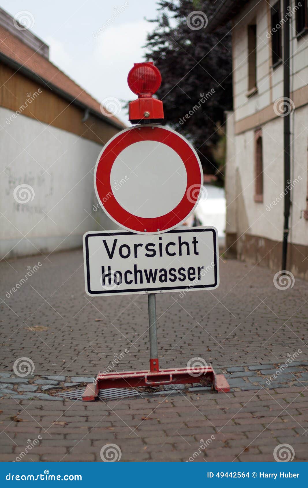 German Sign that Says Caution Flood Stock Photo - Image of flood ...