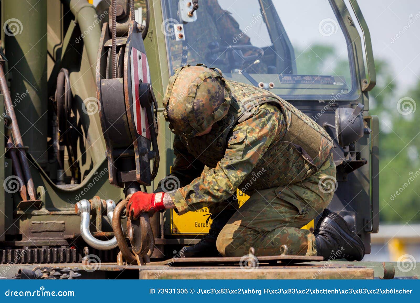 German Soldier Works on a Crane Editorial Photo - Image of machine ...