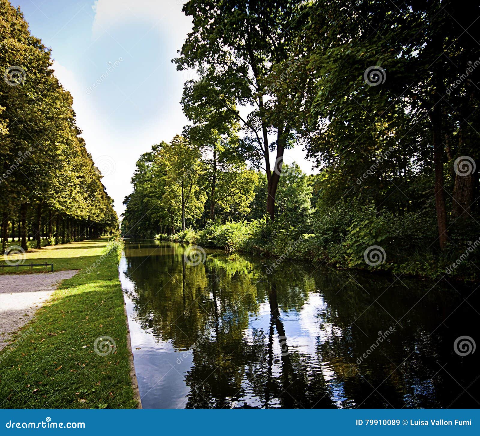 Germany, Bavaria, Park Flanked by a Channel with Still Waters Stock ...
