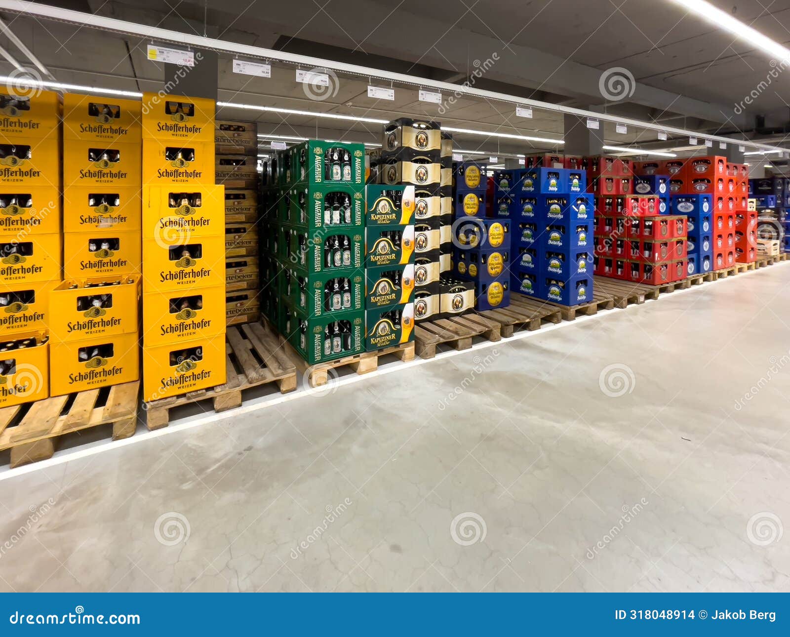 Germany Berlin May 11, 2024. a Row of Beer Boxes are Stacked on Pallets ...