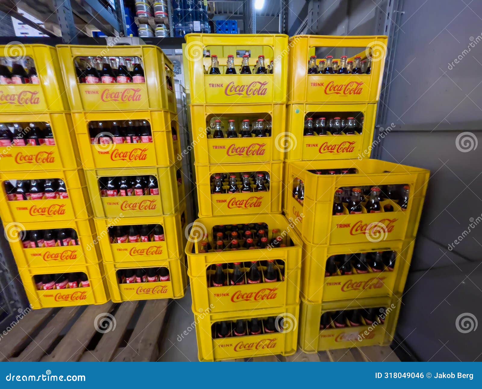 Germany Berlin May 11, 2024. a Stack of Yellow Boxes of Coca-Cola ...
