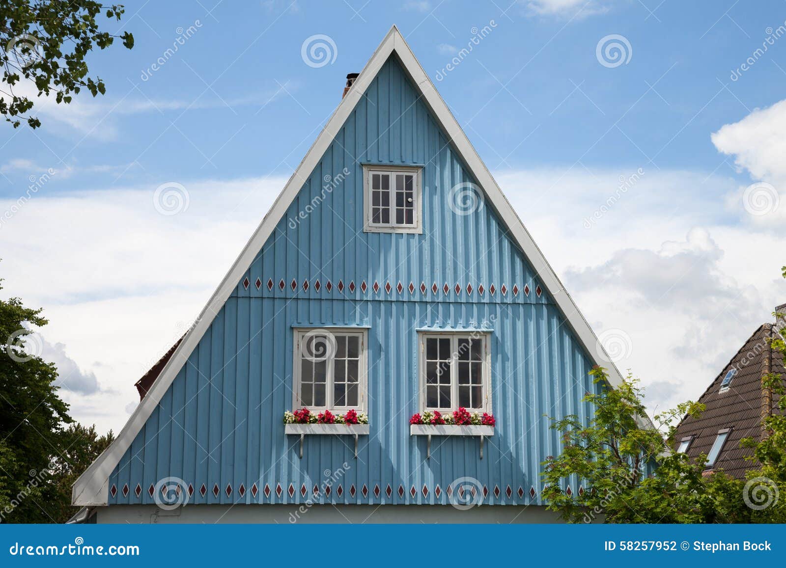 Old Facade Of Gable Roof, Spires, And Bay Windows Royalty-Free Stock ...