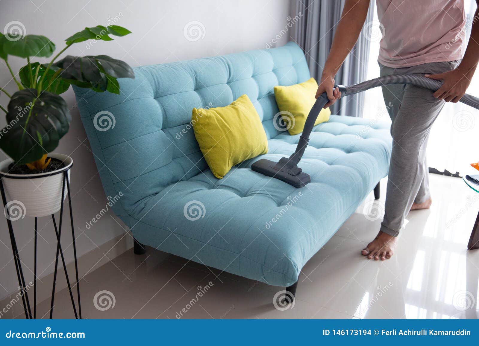 Hand using vacuum cleaner stock photo. Image of janitor - 146173194