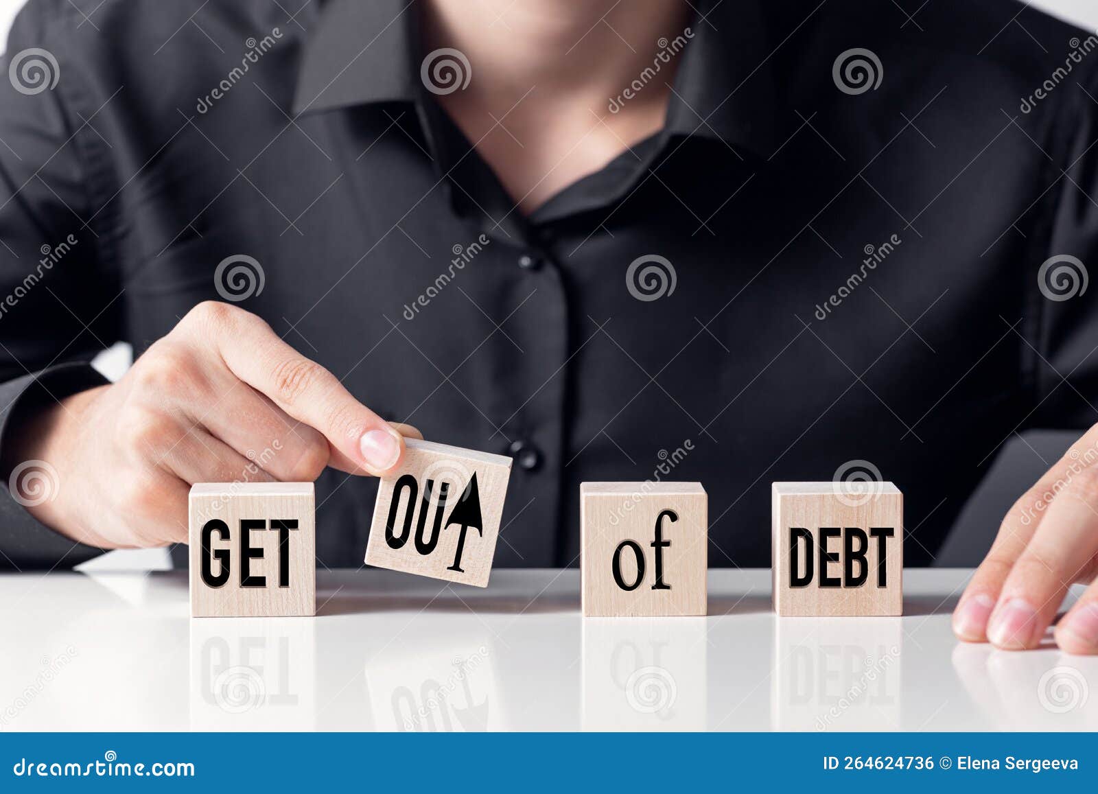 Get Out of Debt Concept, Text on Wooden Blocks, Pay Off Debts Stock ...