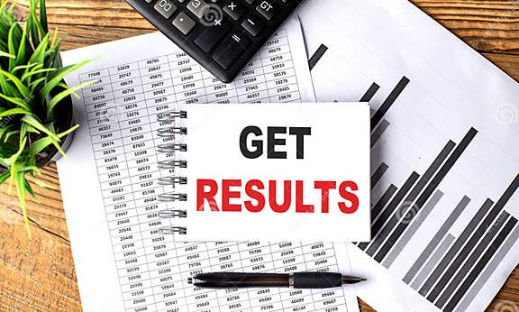 GET RESULTS Text on a Notebook with Chart and Calculator Stock Image ...