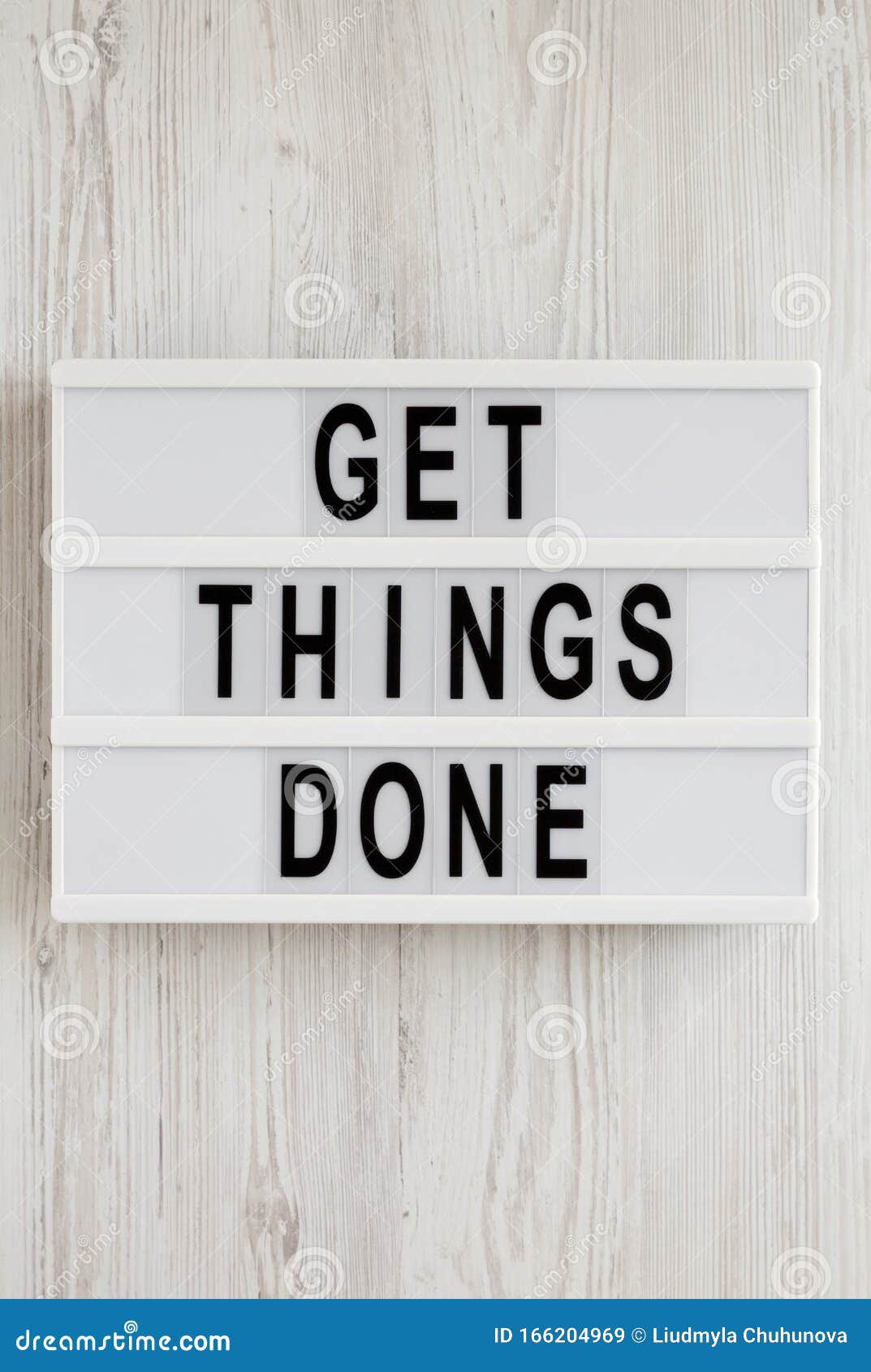 `Get Things Done` Words on a Lightbox on a White Wooden Surface, Top ...