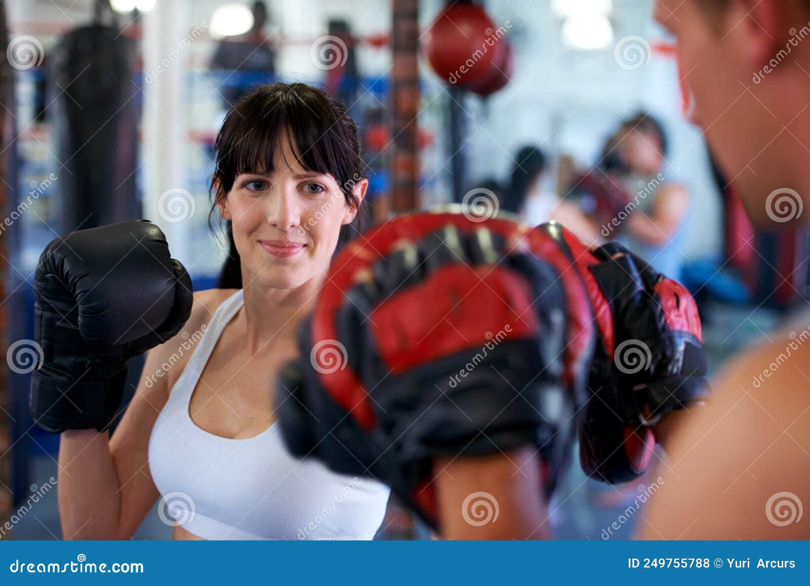 She Gets Better Everyday. a Female Boxer Sparring with Her Practice ...