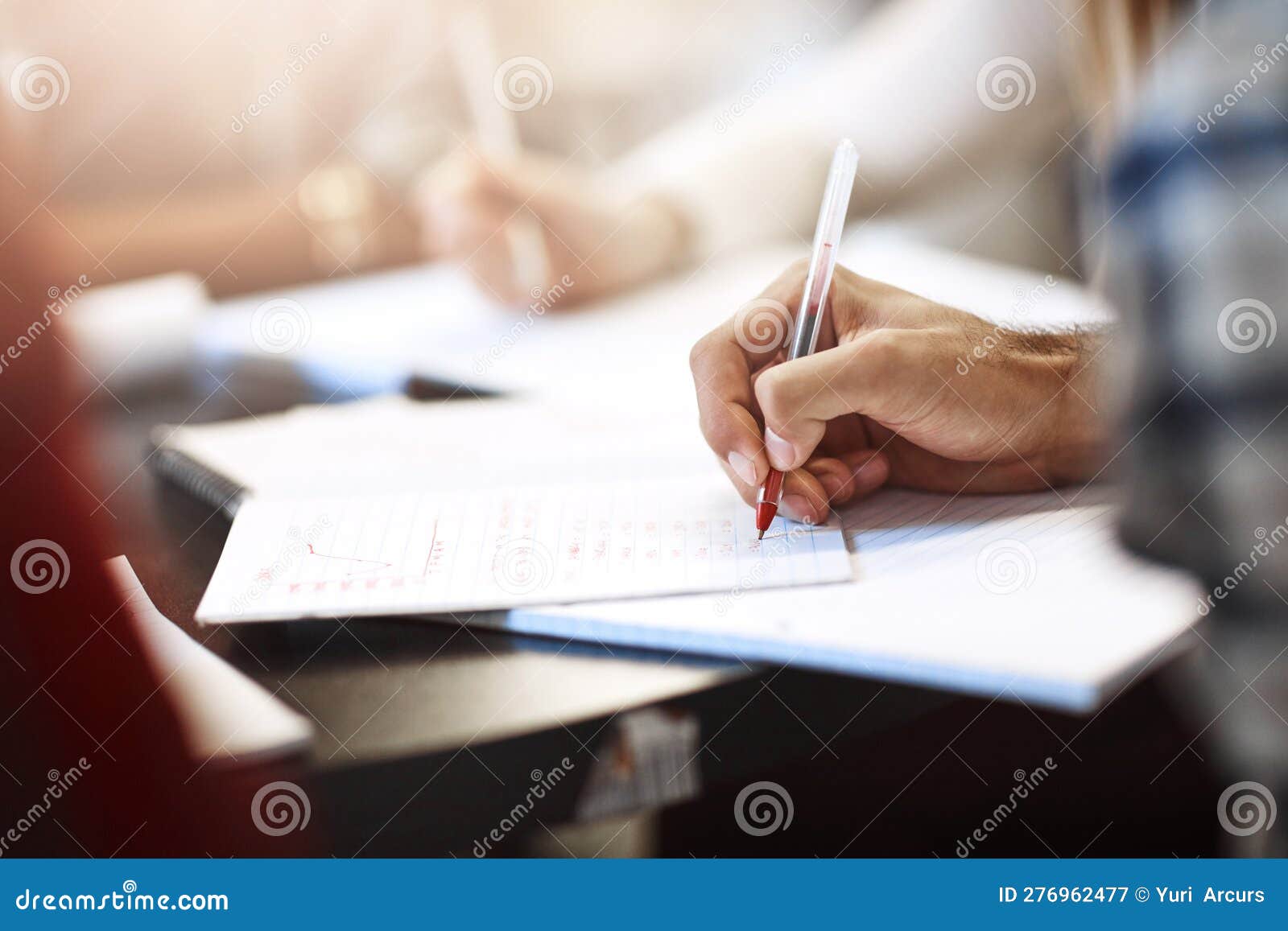 Getting Ahead on Their Studies. Closeup Shot of University Students ...