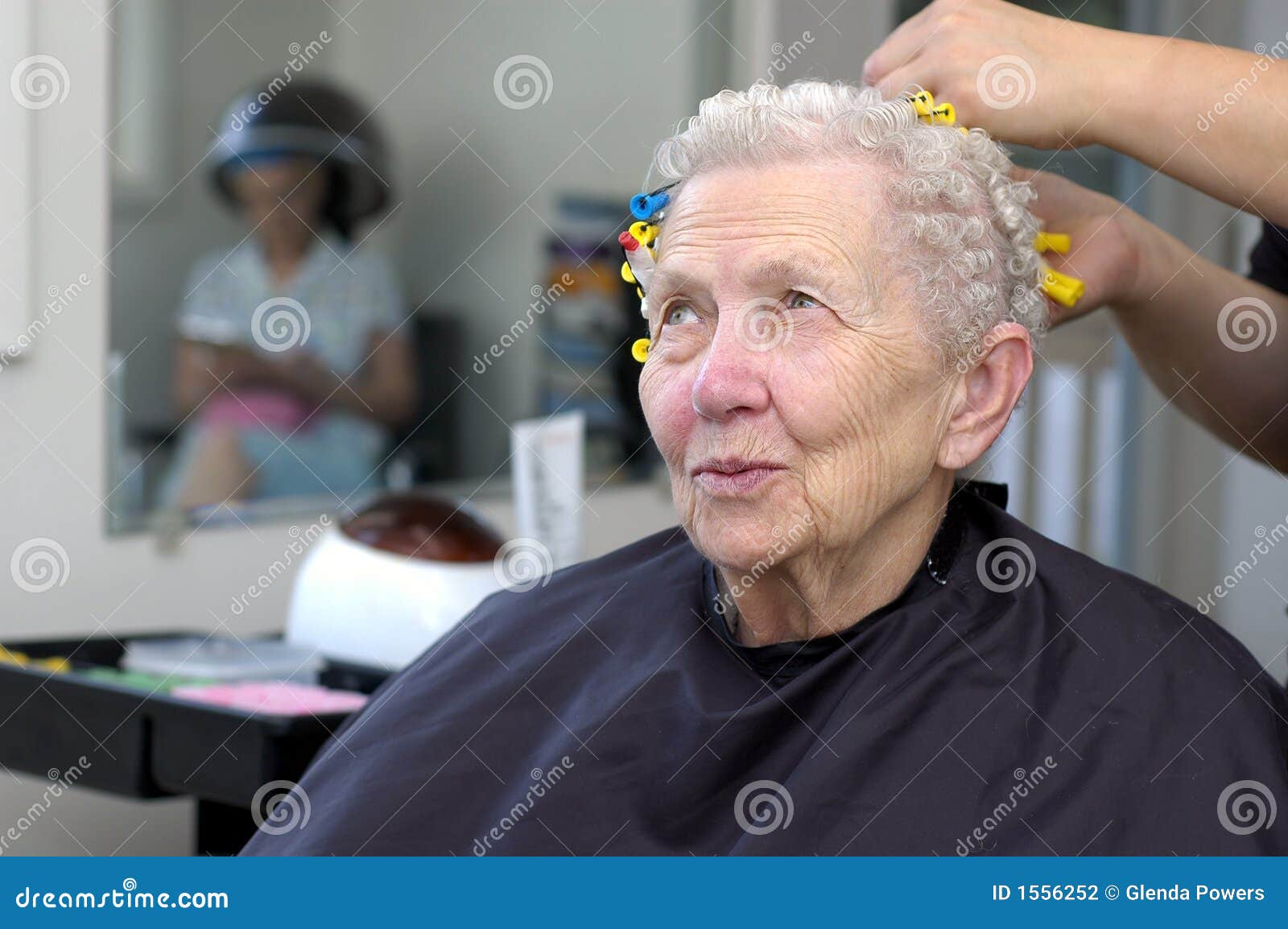 Getting Curled. stock photo. Image of adults, female, curling - 1556252