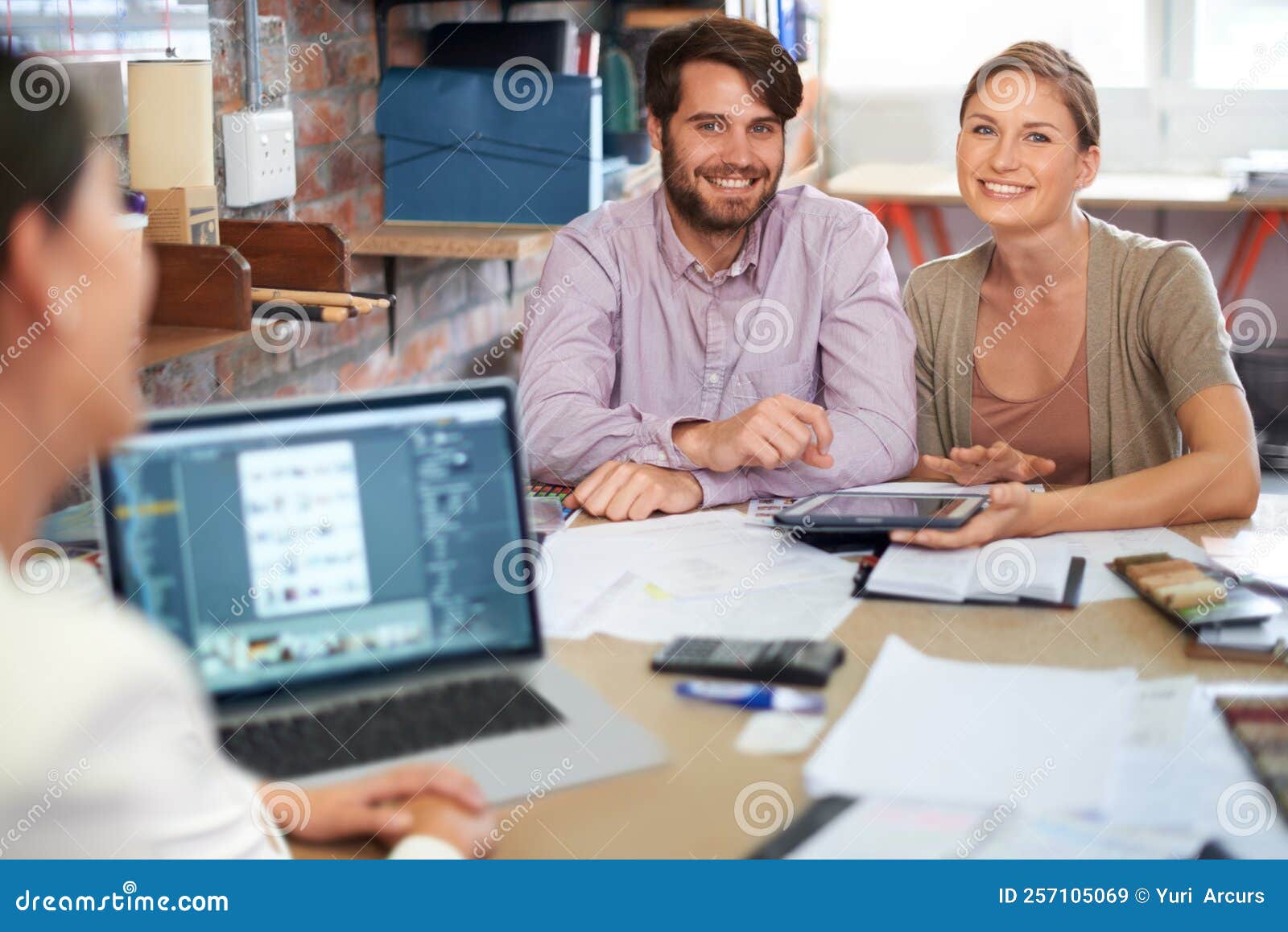 Getting it Done with a Smile. a Young Creative Professionals Working in ...