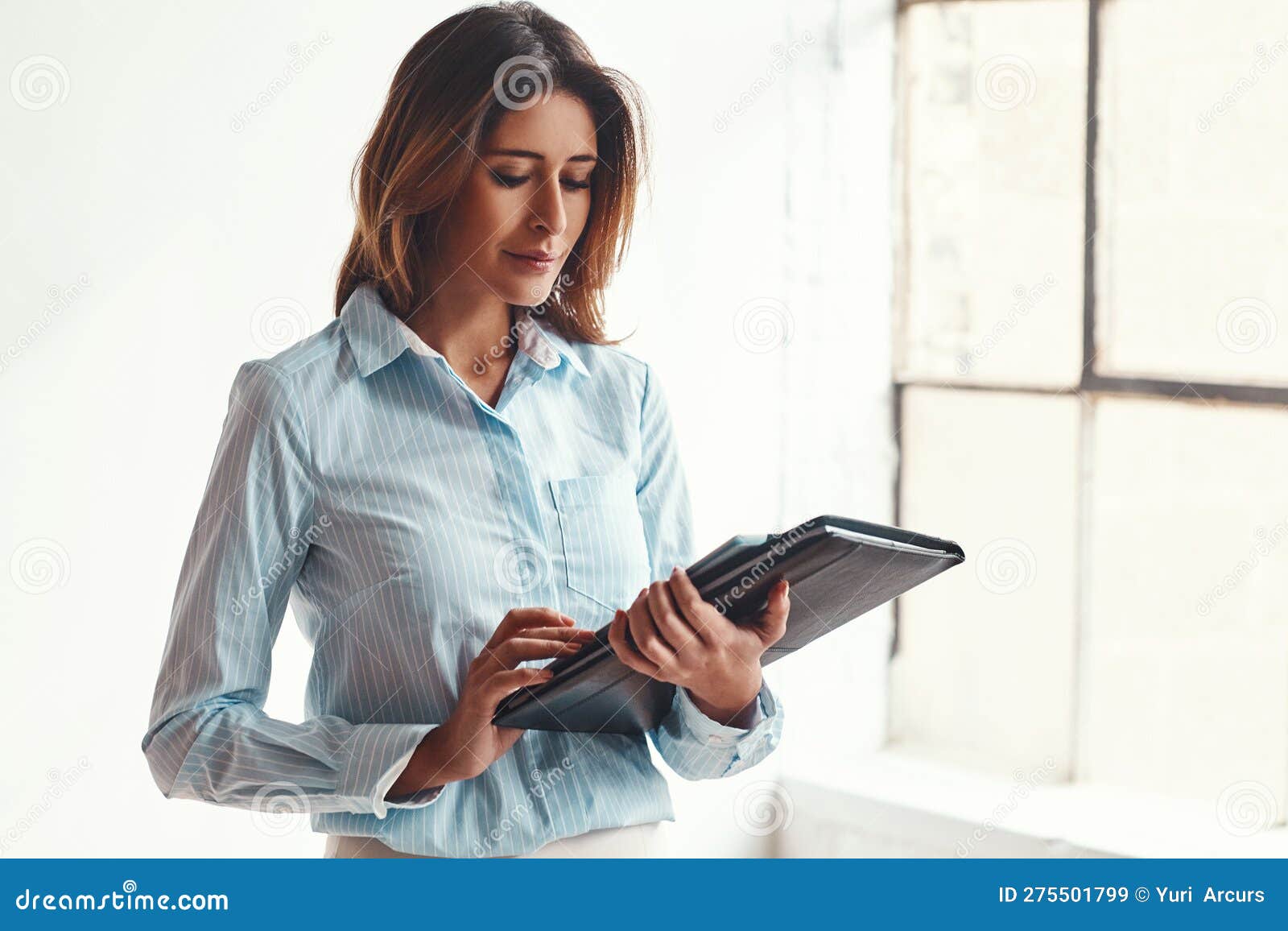 Getting it Done is What she Does. a Confident Businesswoman in a Modern ...