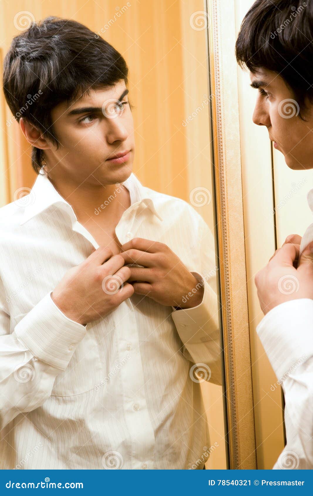 Getting dressed stock image. Image of handsome, young - 78540321