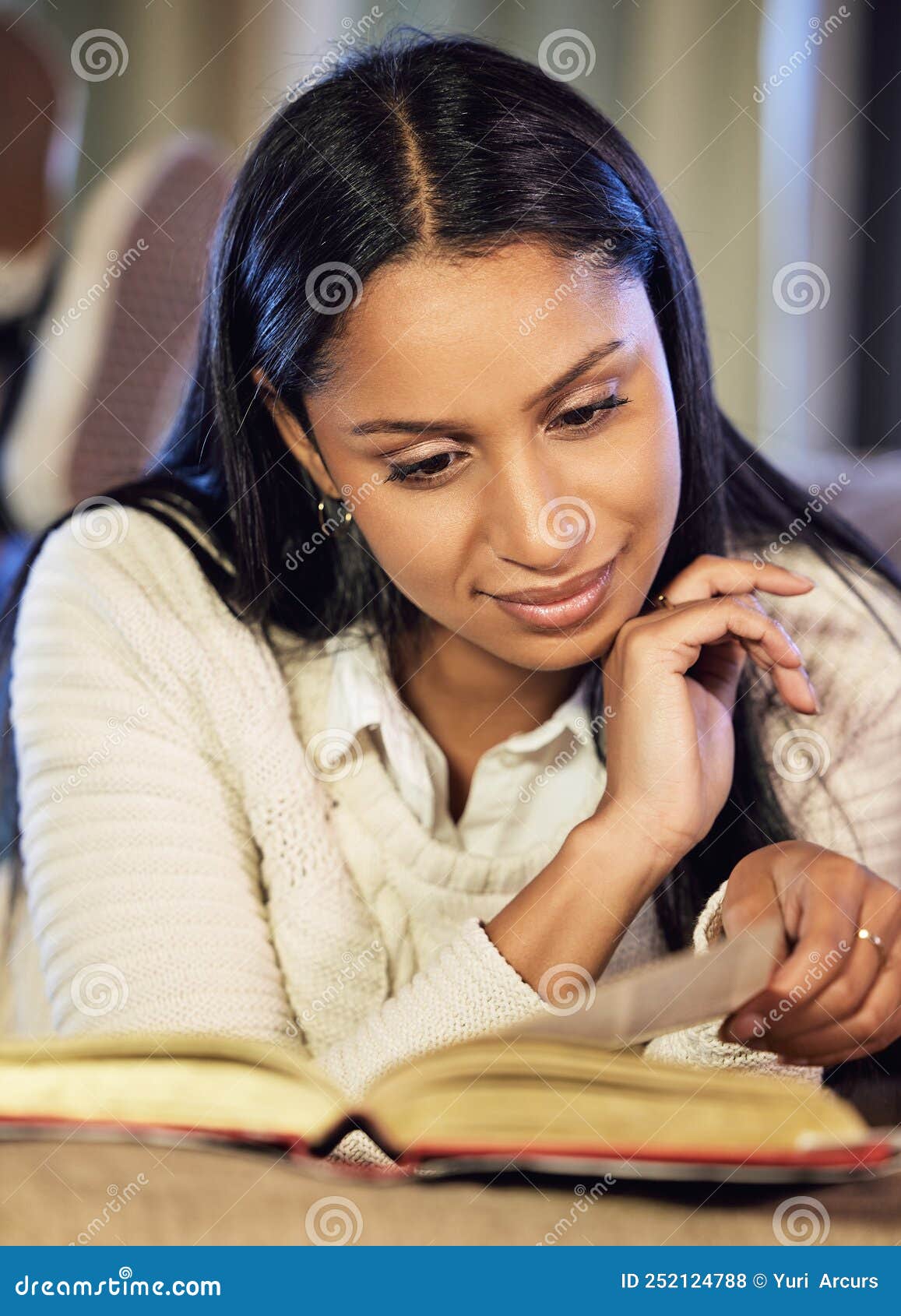 Getting Familiar with the Study Material. an Attractive Young Woman ...