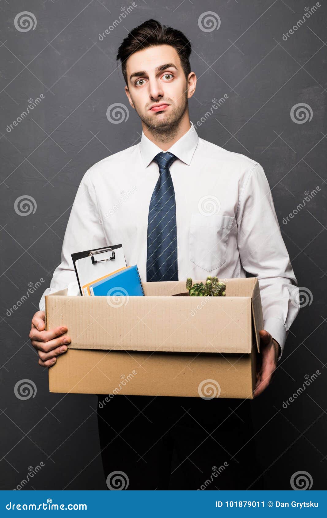 Getting Fired. Handsome Businessman in Formal Wear Holding a Box with ...