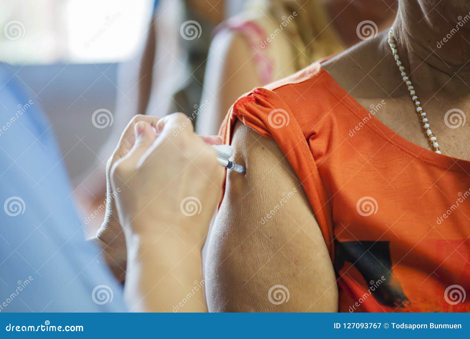 Getting Flu Vaccines from a Doctor with an Injection in the Arm. Stock ...