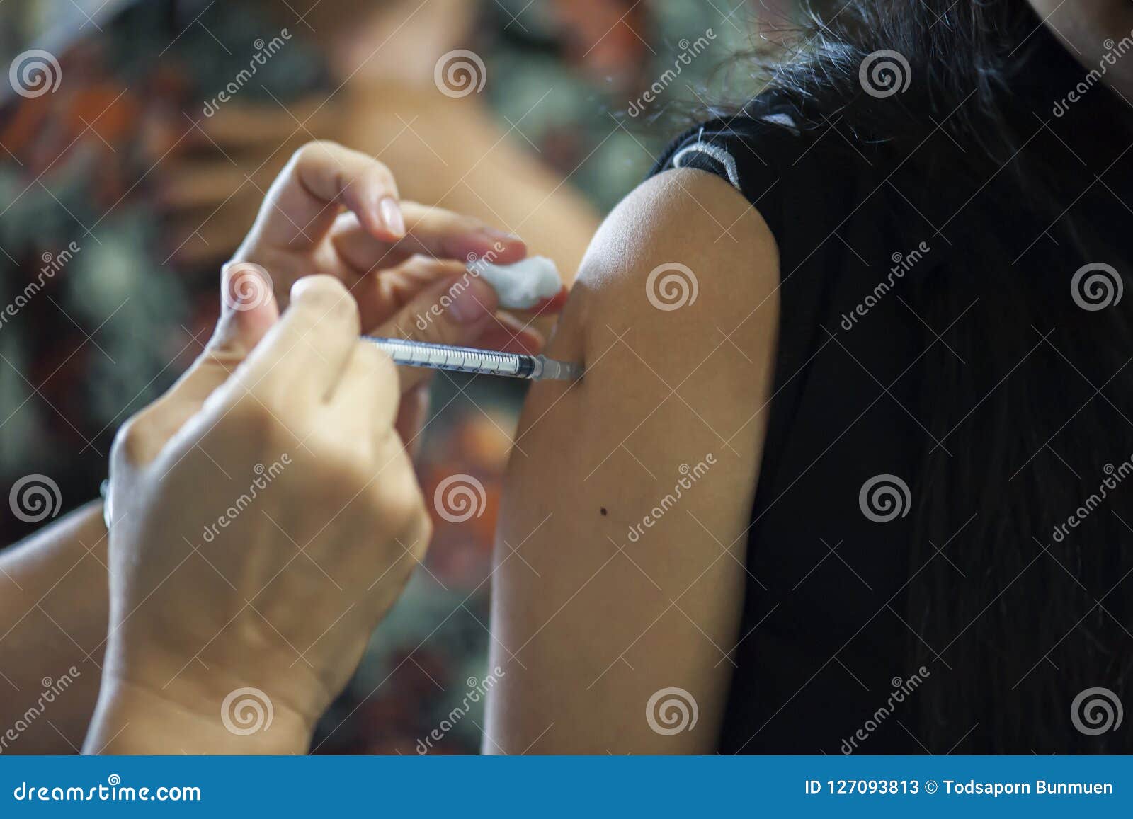 Getting Flu Vaccines from a Doctor with an Injection in the Arm. Stock ...